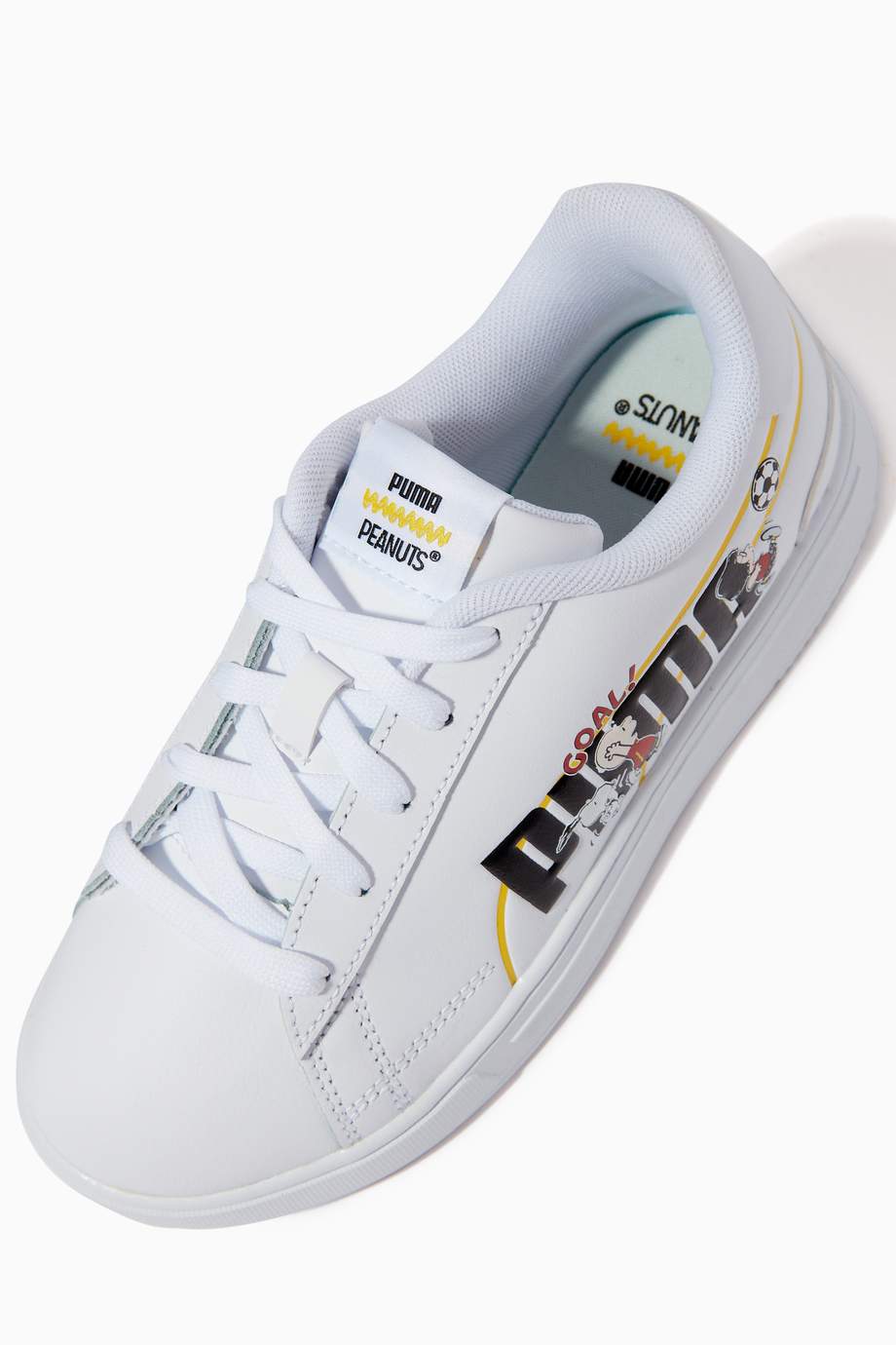 Shop Puma White x PEANUTS Serve Pro Sneakers in Leather for Kids ...